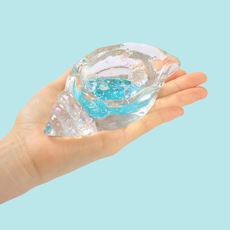 Blue Crystal Conch Taba Squishy – FUFUSQUISHY